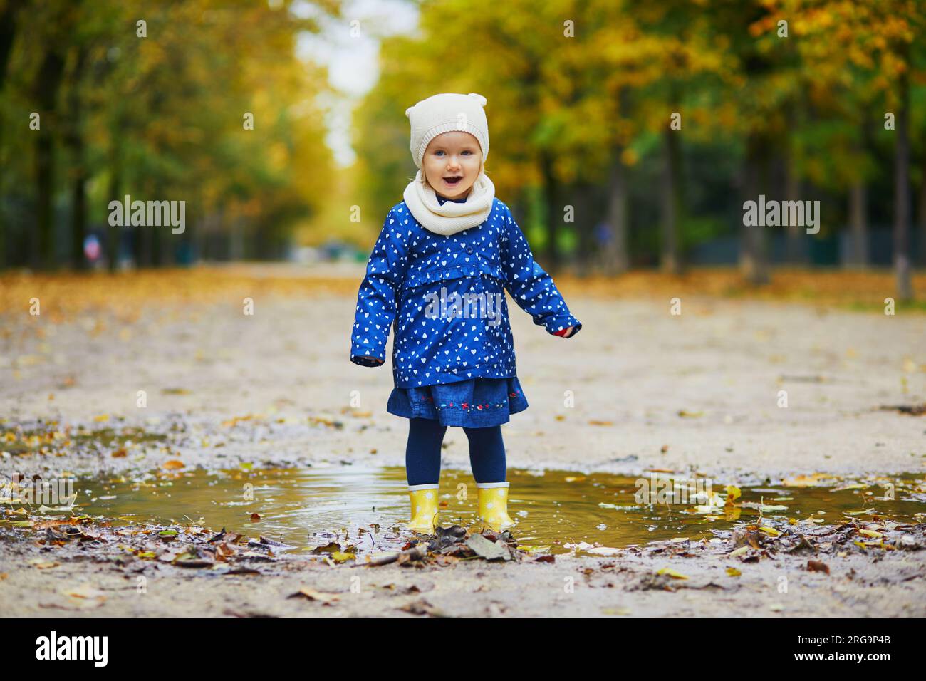 Yellow Rain Boots Puddle