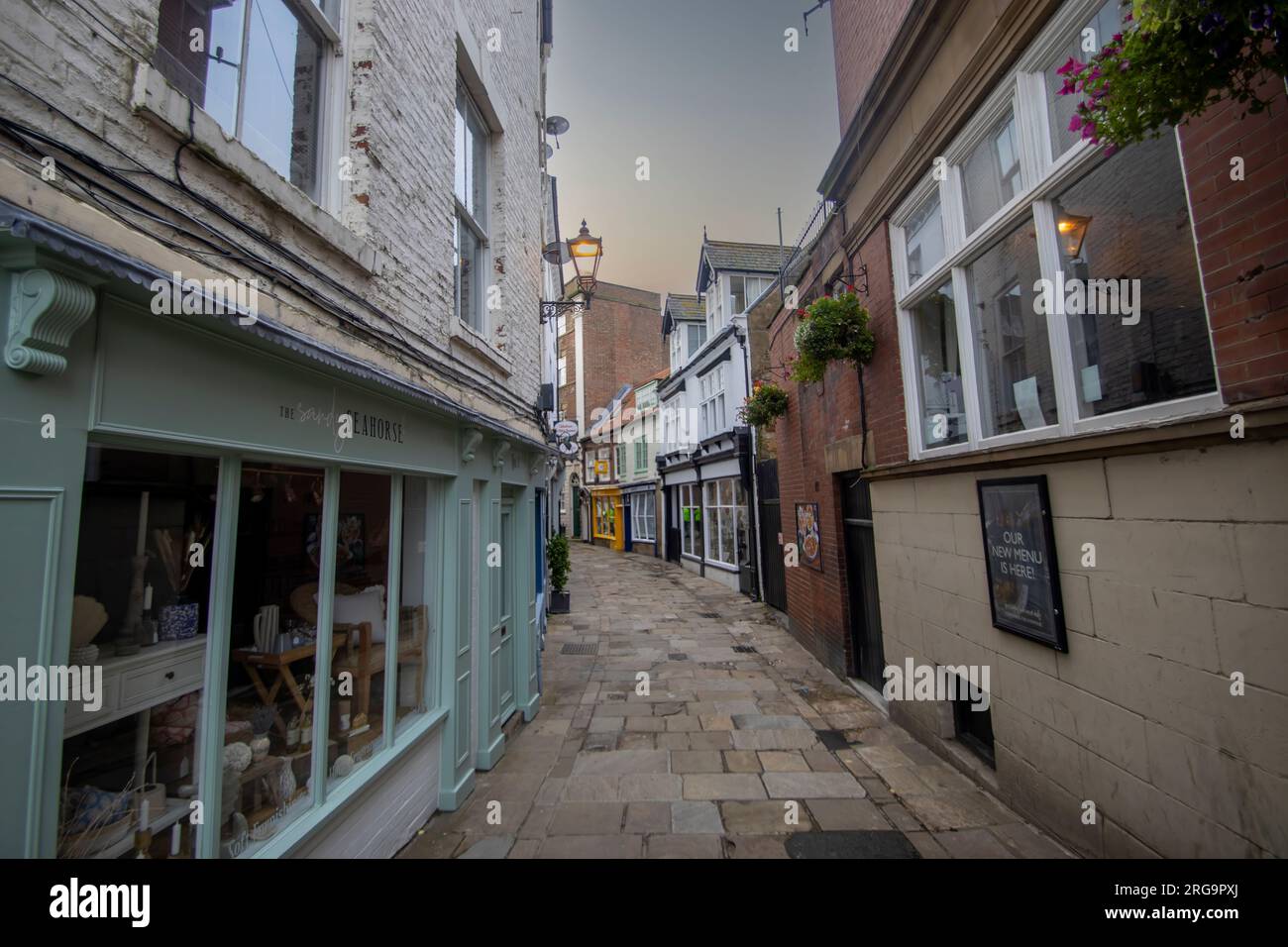 The narrow historic streets of Whitby in North Yorkshire, UK Stock ...