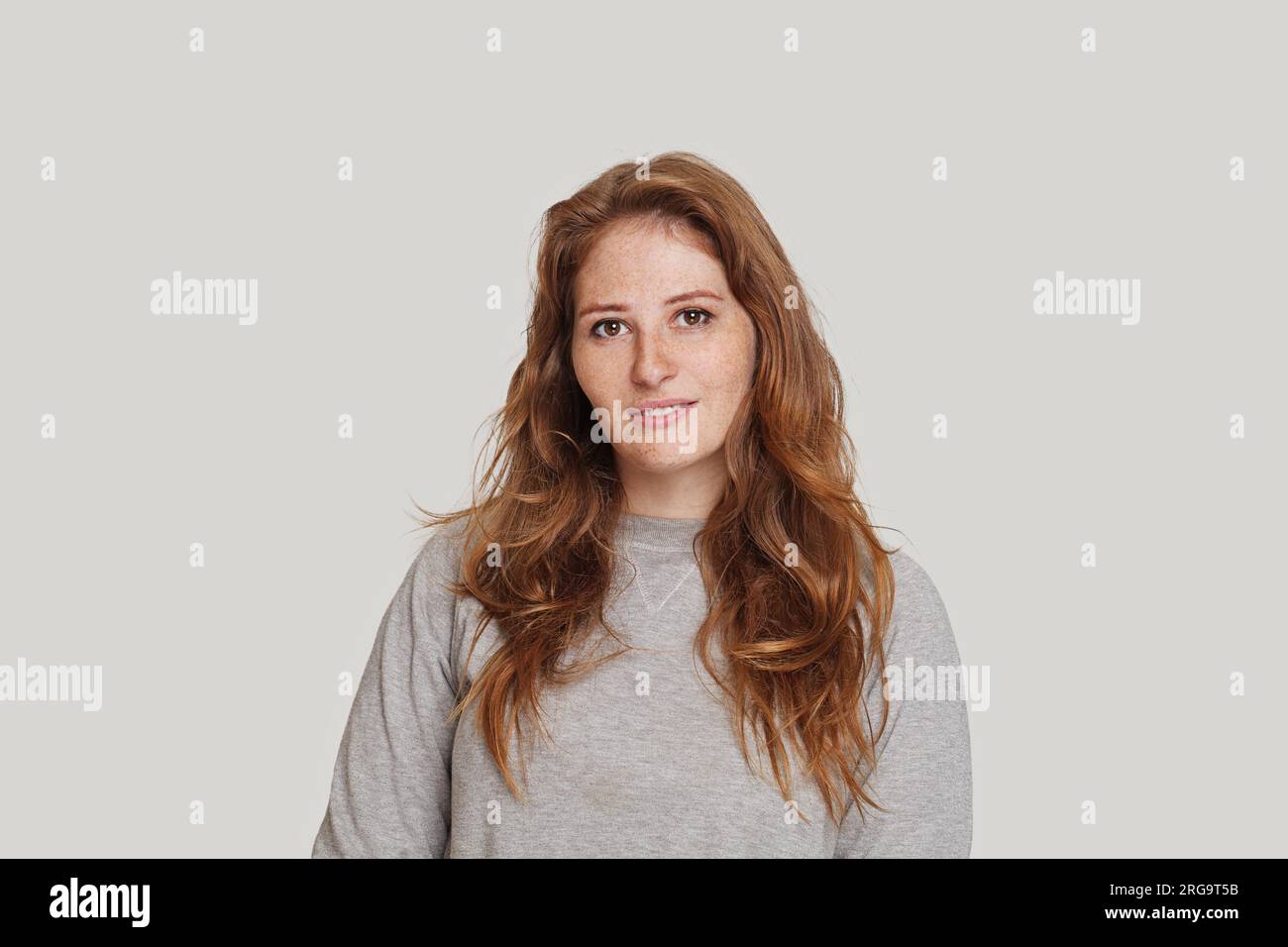 Confident clever woman studio portrait Stock Photo - Alamy