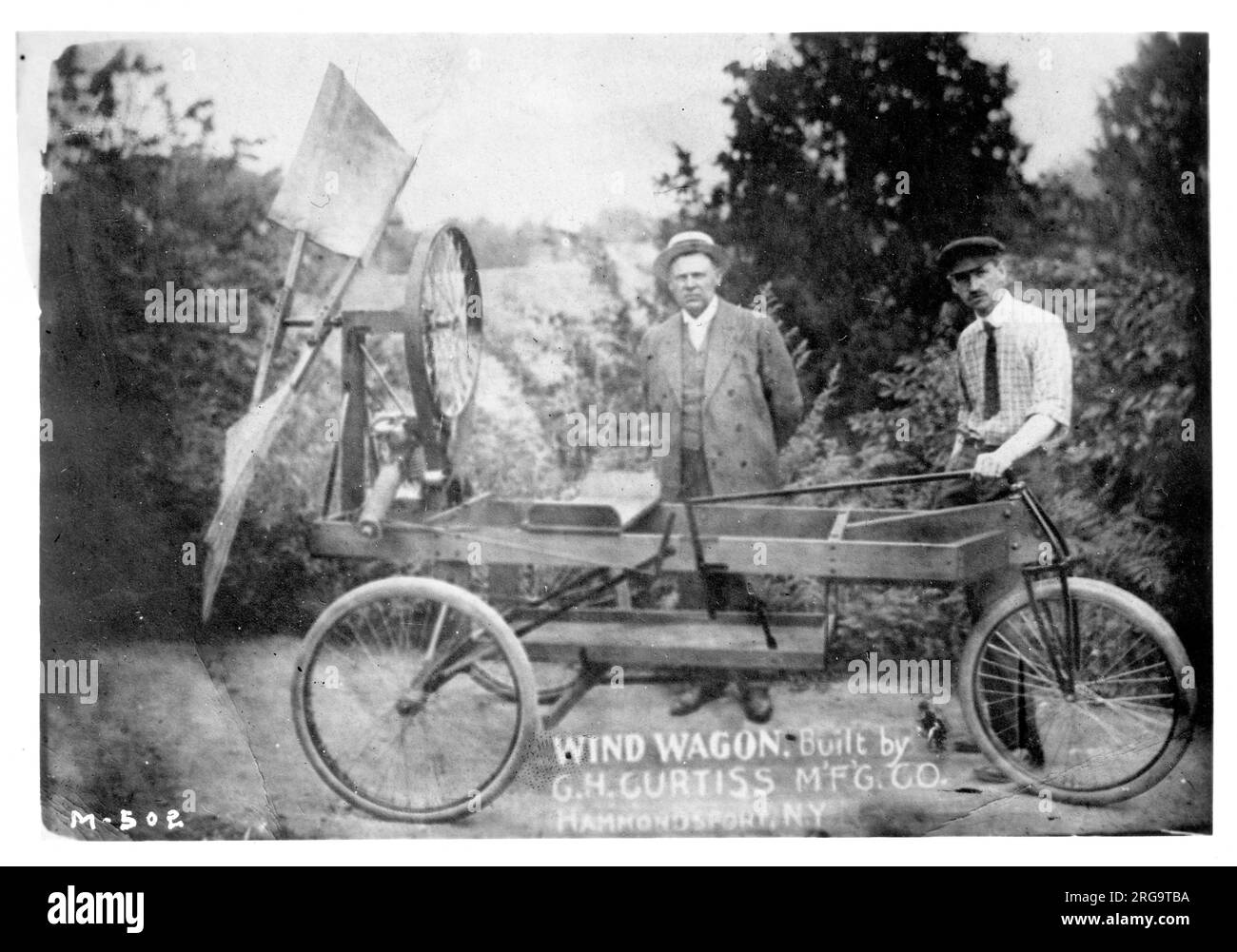 Glenn Curtiss sat in one of his Wind Wagons with Thomas Scott Baldwin ...