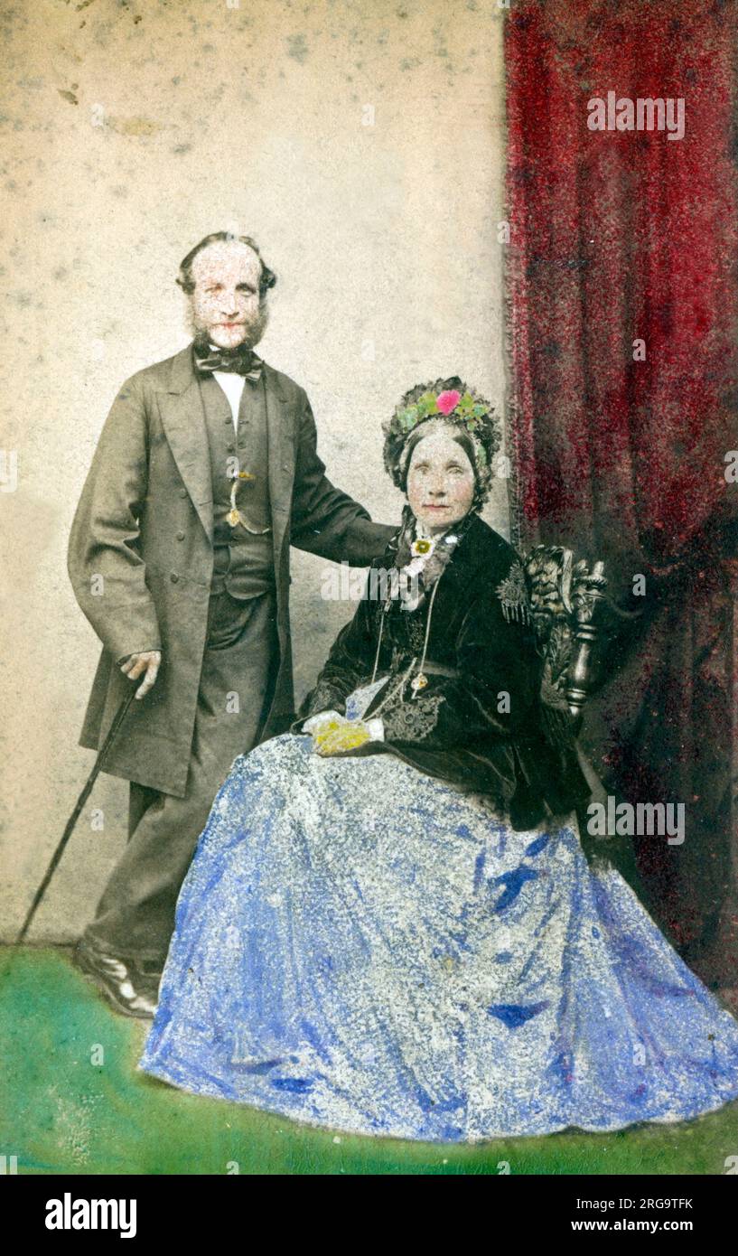 A hand-tinted Victorian studio carte de visite (CdV) photograph of a ...