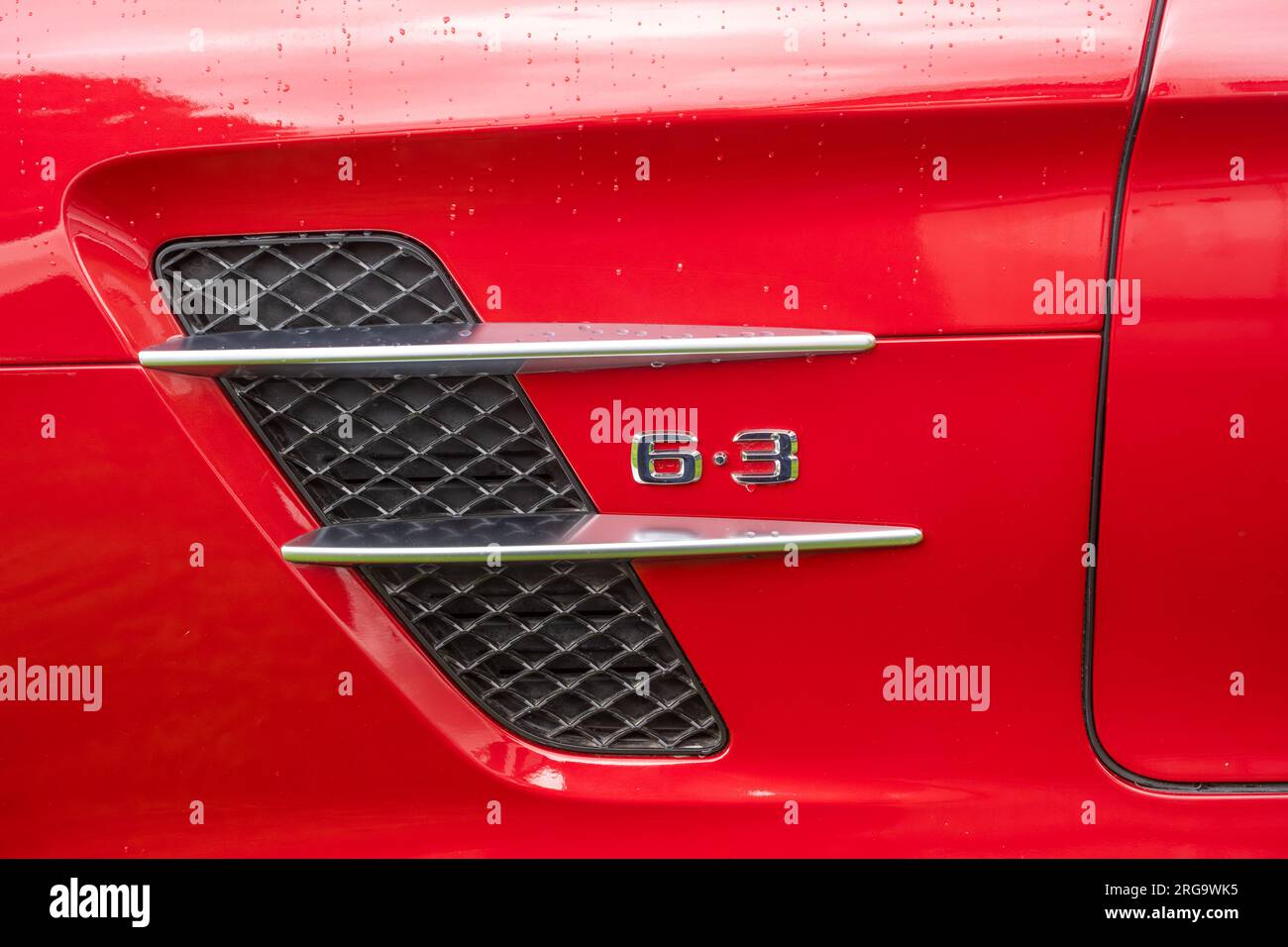 A close-up of the left side panel showing the air vent and 6.3 ...