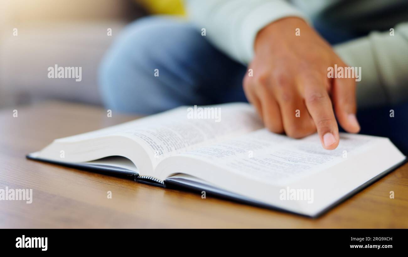 Prayer, reading and bible with man in living room for worship ...