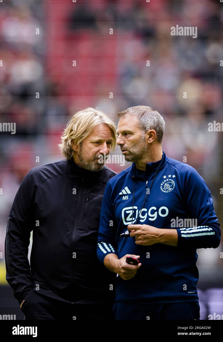 AMSTERDAM - 08/08/2023, Technical director Sven Mislintat and trainer ...