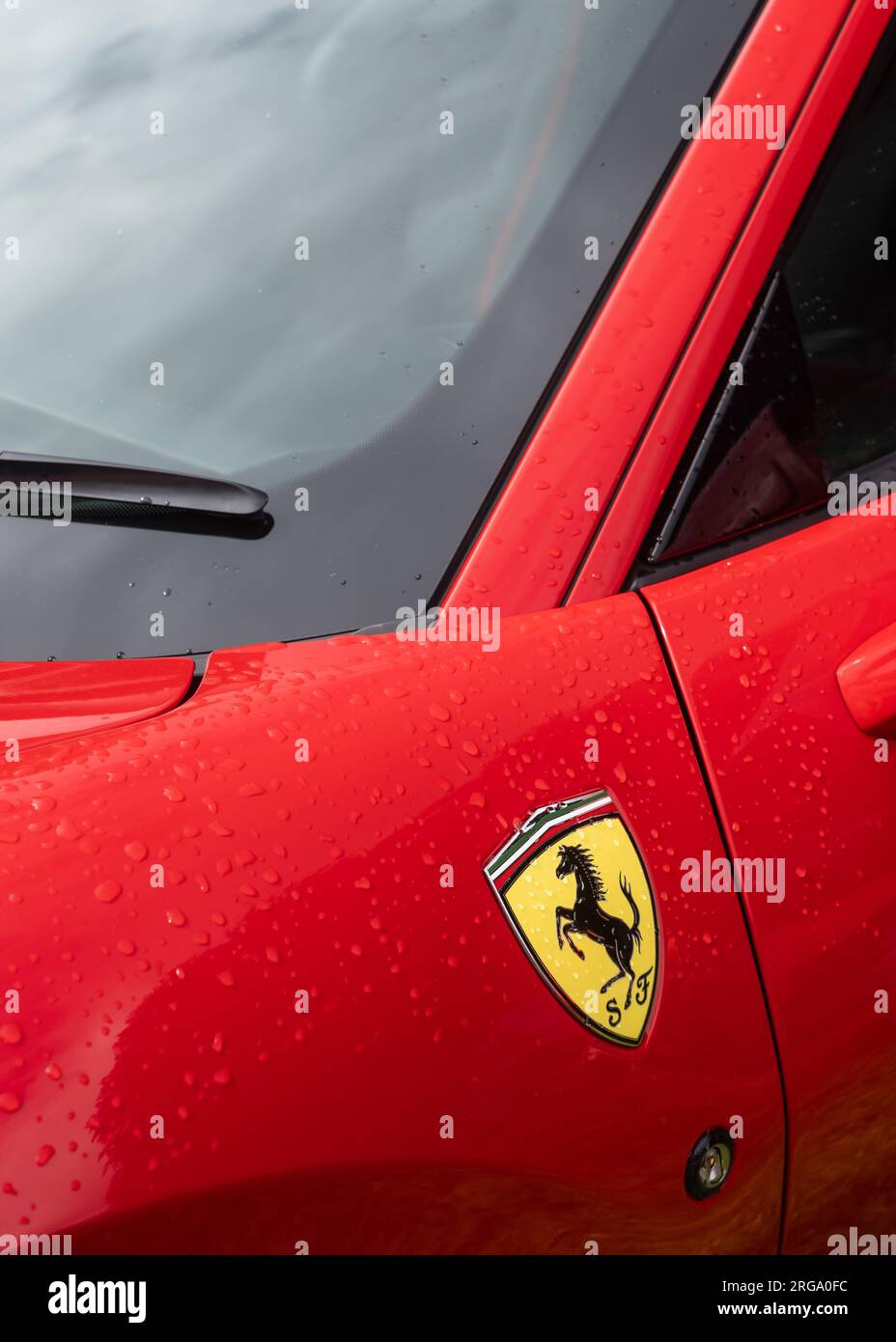The Prancing Horse side panel logo and windscreen section of a red ...