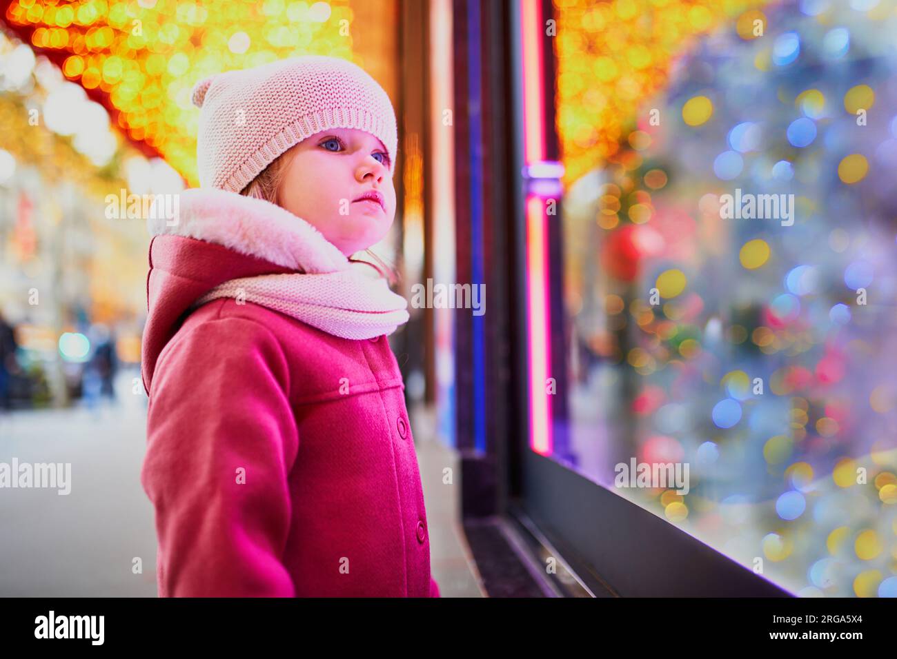 Children window shopping french department store hi-res stock ...