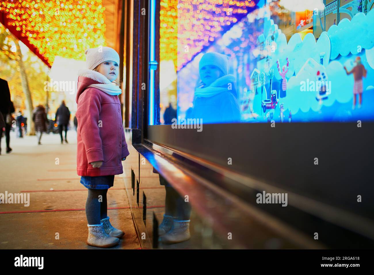 Children window shopping french department store hi-res stock ...