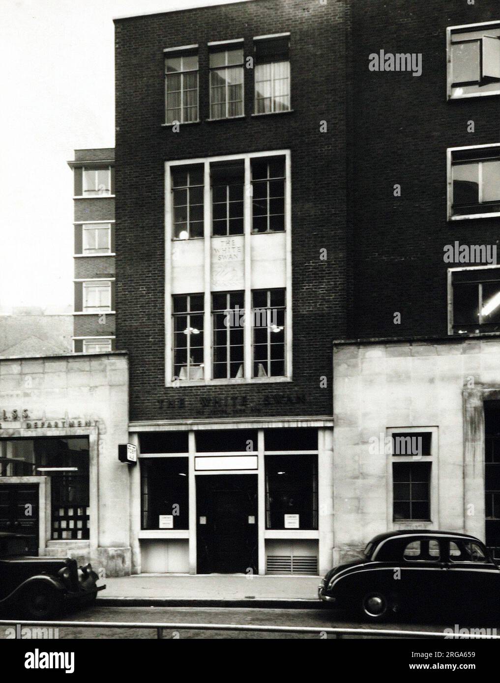 Photograph of White Swan PH, Holborn (New), London. The main side of ...