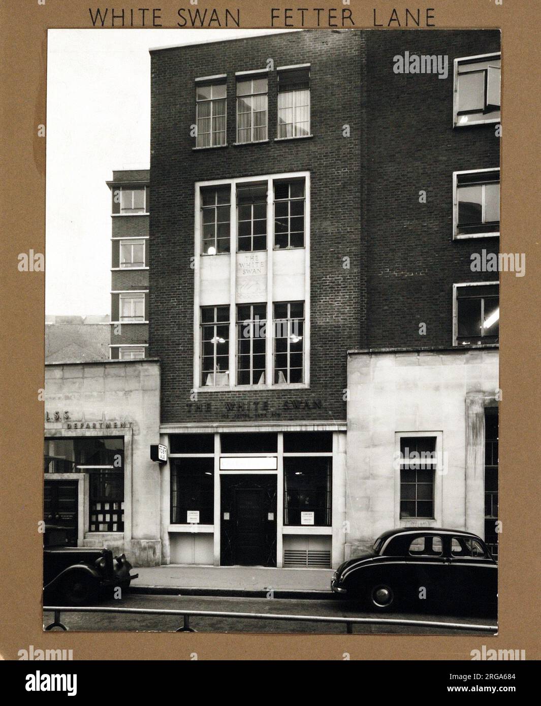 Photograph of White Swan PH, Holborn (New), London. The main side of ...