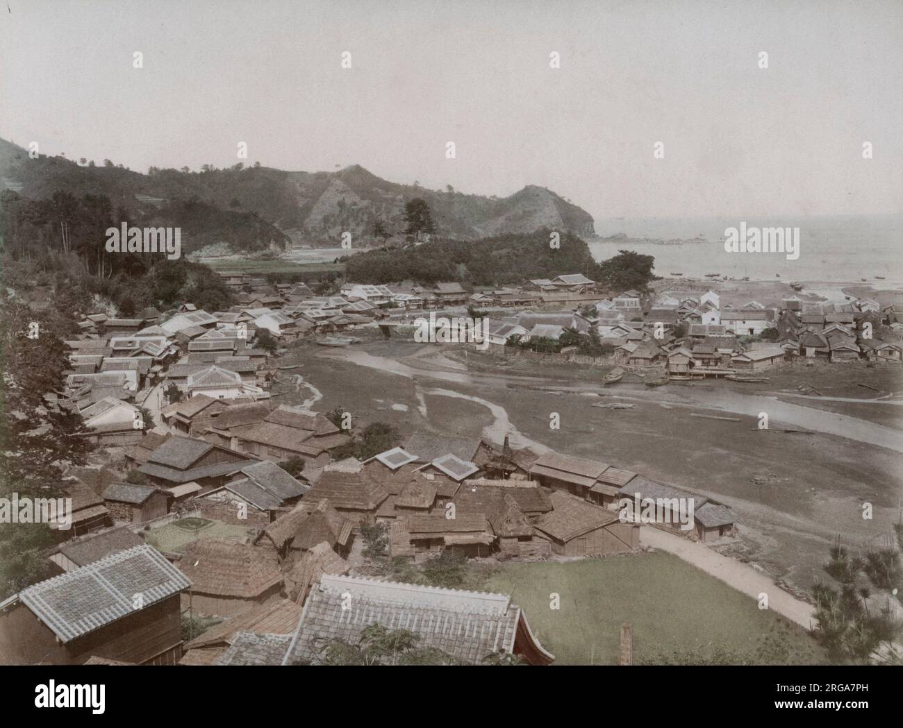Rooftop view of the river estuary at Mogi Japan. Vintage 19th century ...