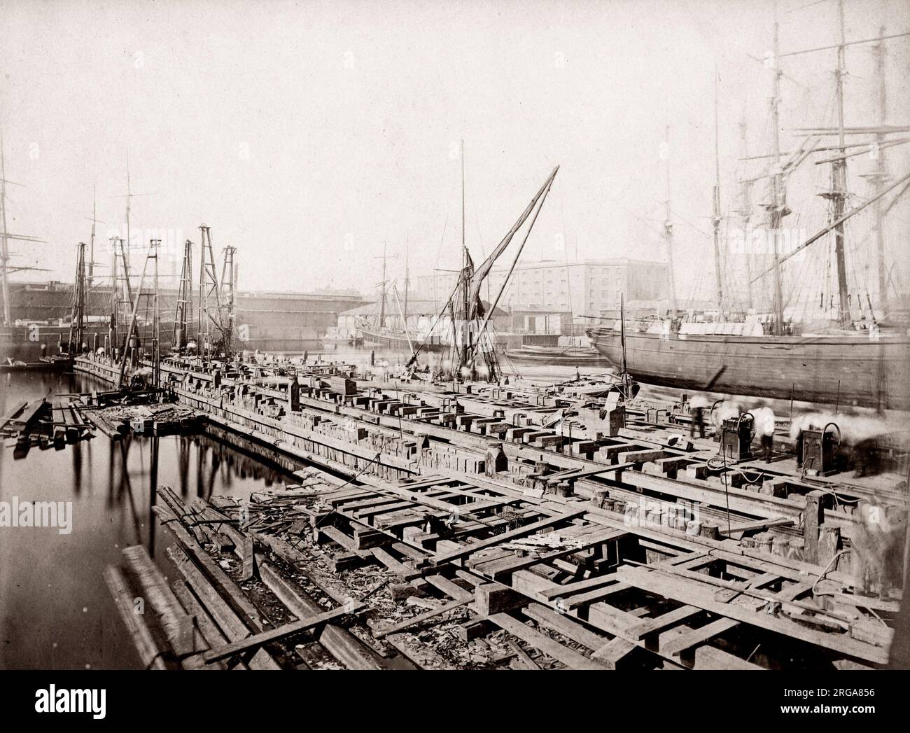 c.1880s - dockyard scene, probably London, with cranes Stock Photo - Alamy