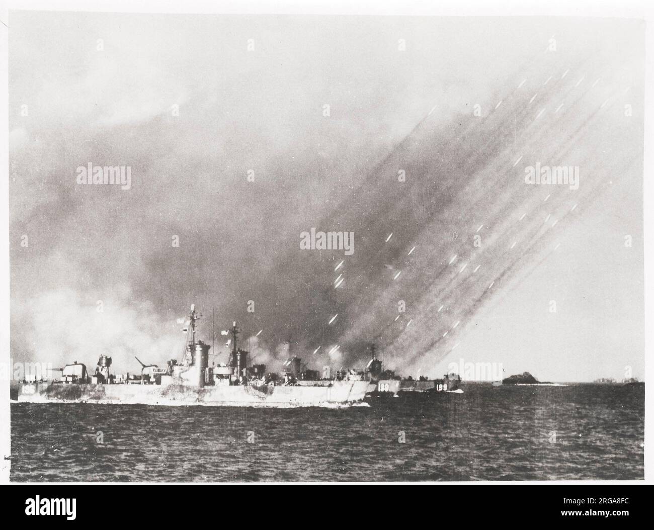 Vintage World War II photograph - navy ship releases a salvo in the ...