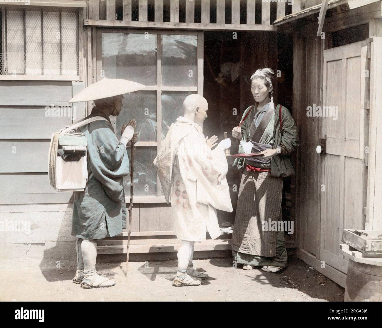 c.1880s Japan - pilgrims begging for alms Stock Photo - Alamy