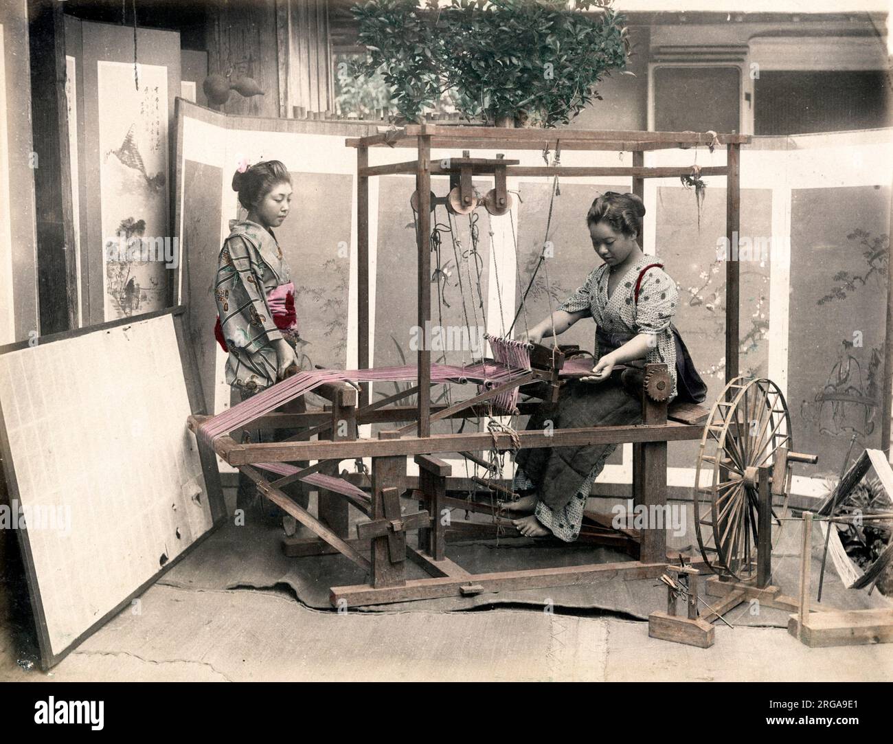19th century vintage photograph: Young women weaving silk, Japan Stock ...