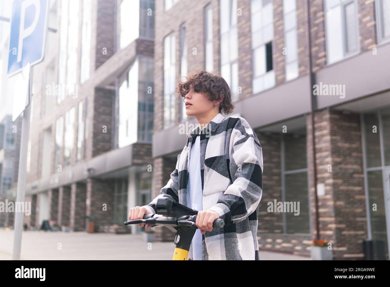 Person rides scooter down hi-res stock photography and images - Alamy