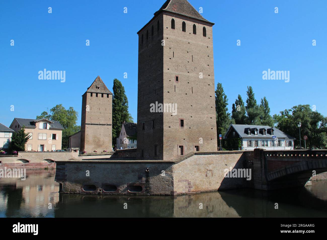 medieval towers, bridge (ponts couverts) and river ill in strasbourg in ...