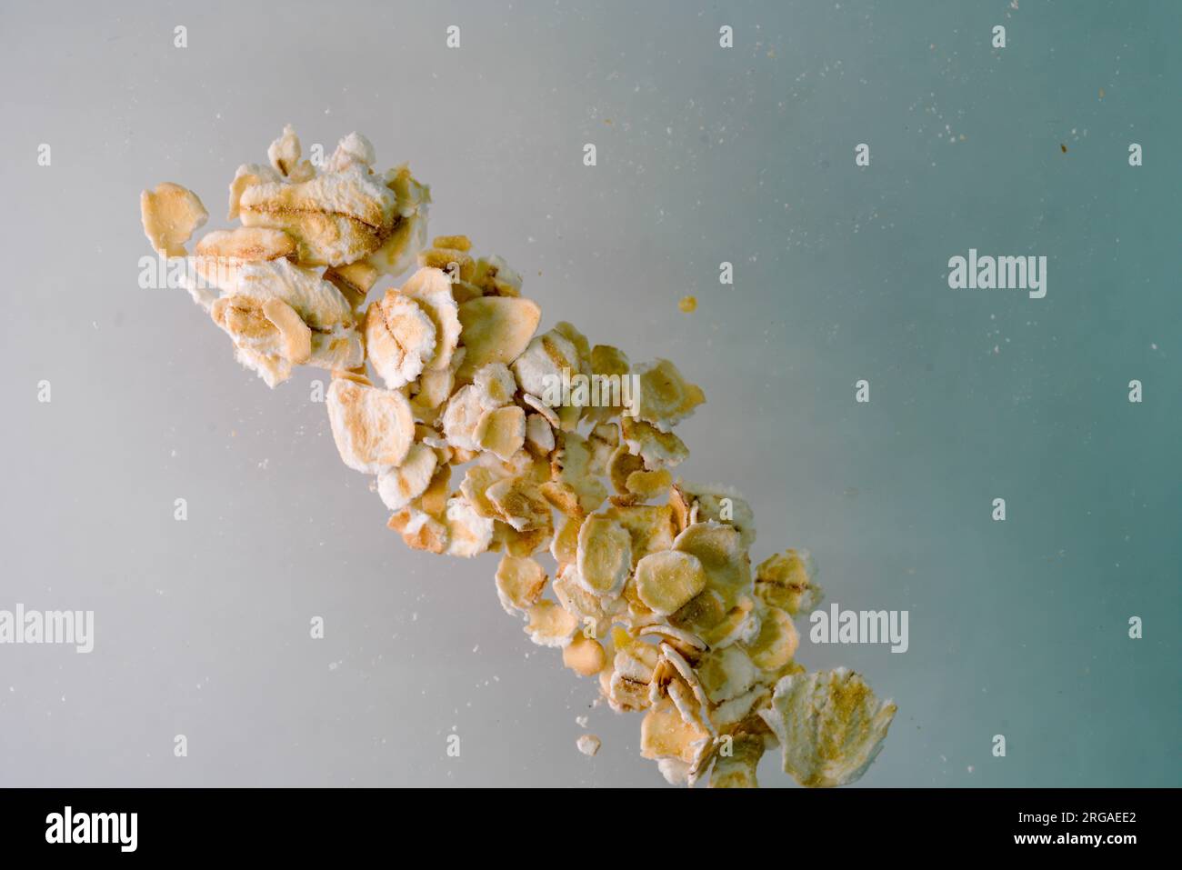 Oatmeal is a whole grain cereal product made from seed oats Stock Photo ...