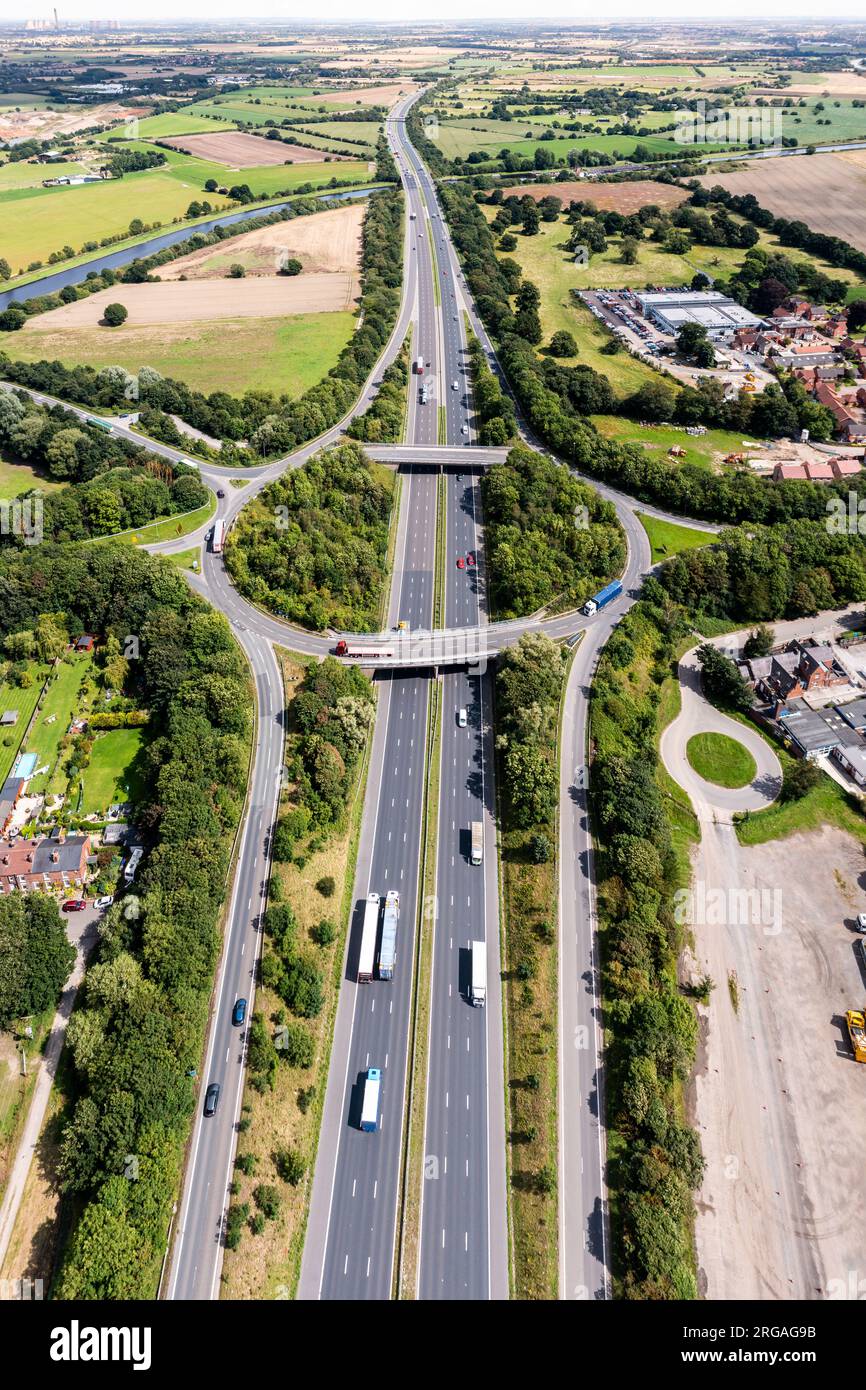 Aerial vertical panorama directly above a busy road intersection ...