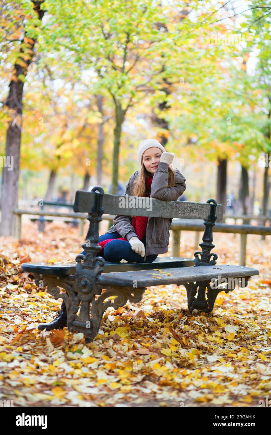 Sad girl in red scarf hi-res stock photography and images - Alamy