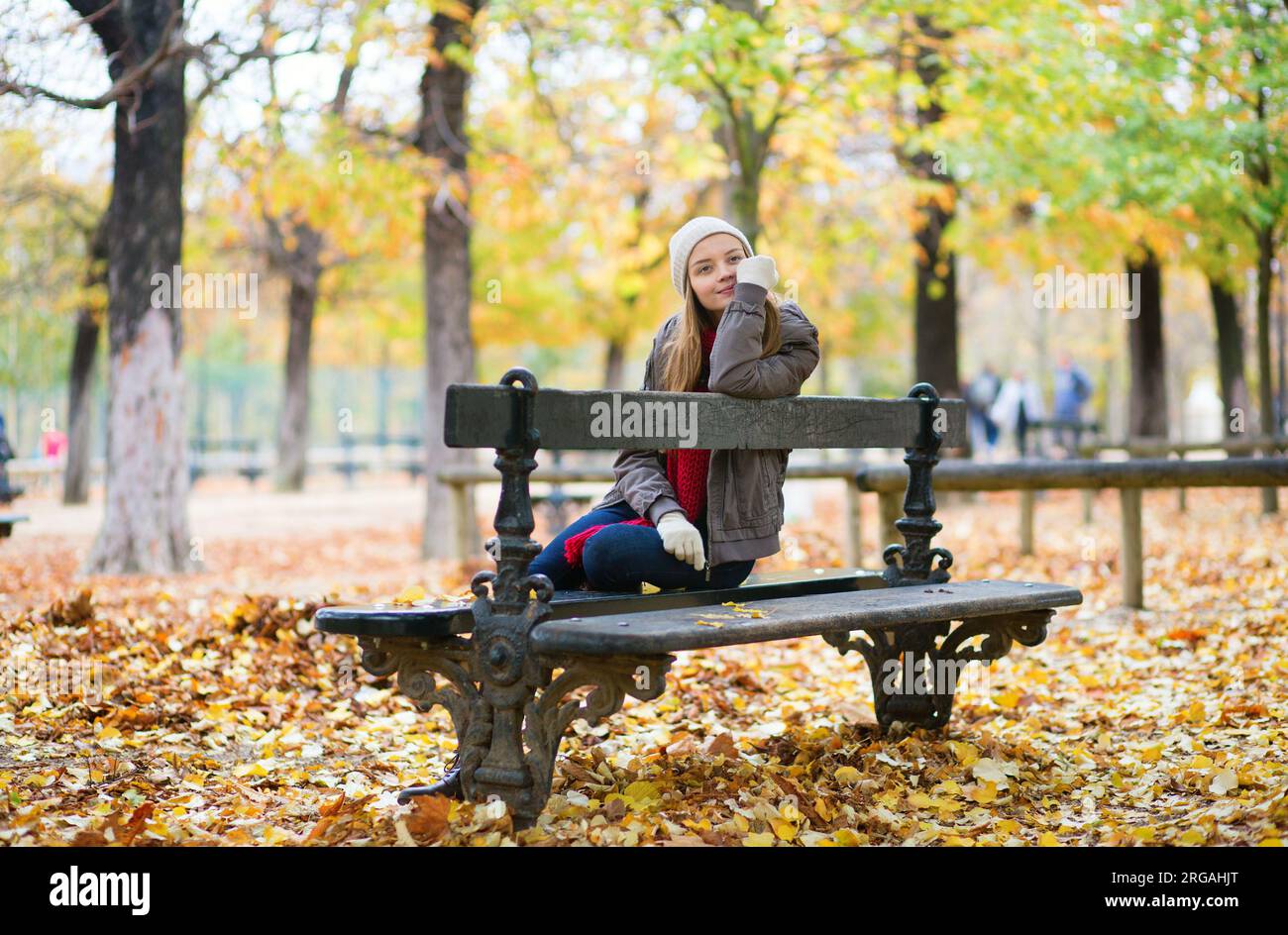 Young Girl Sitting On A Park Bench Stock Photo Image Of A Girl Is