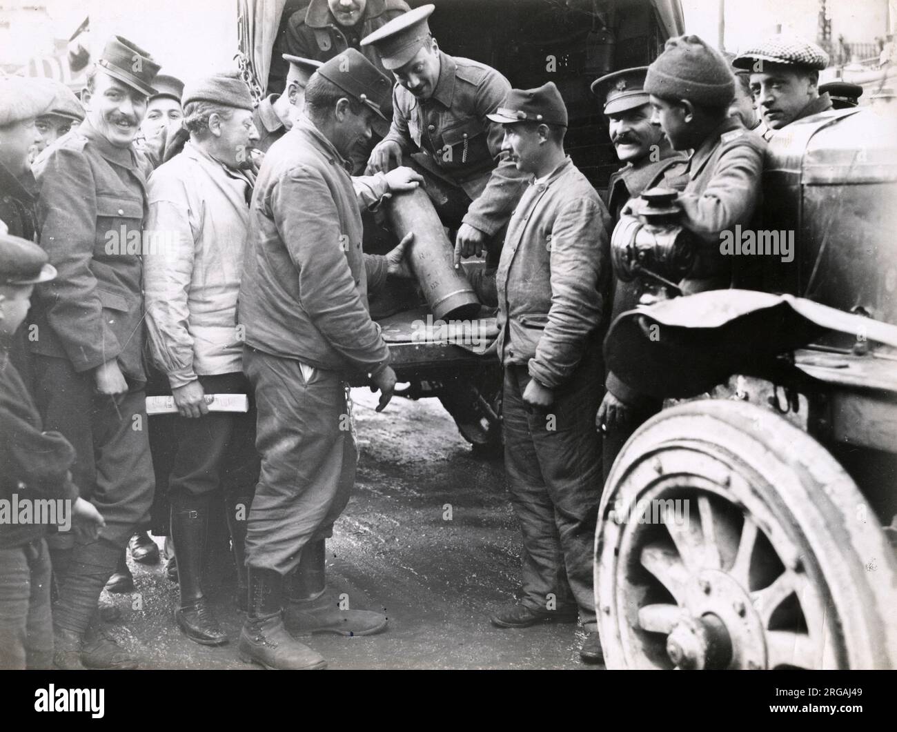 Vintage World War One photograph - WWI: howitzer shells being looked at ...