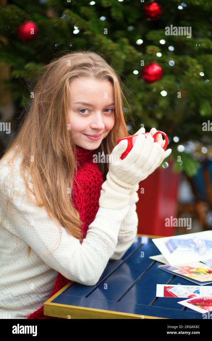 Woman writing postcards hi-res stock photography and images - Alamy