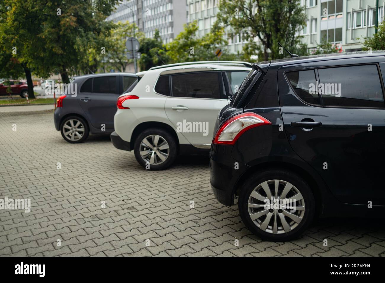 On street parking parked cars black vehicles hi-res stock photography ...