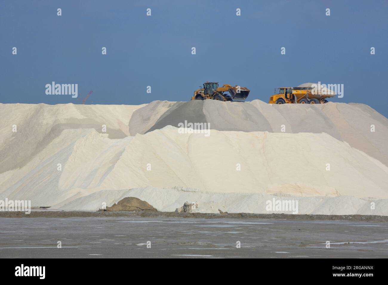 Salt mountain for salt extraction with dump truck, Salin-de-Giraud ...