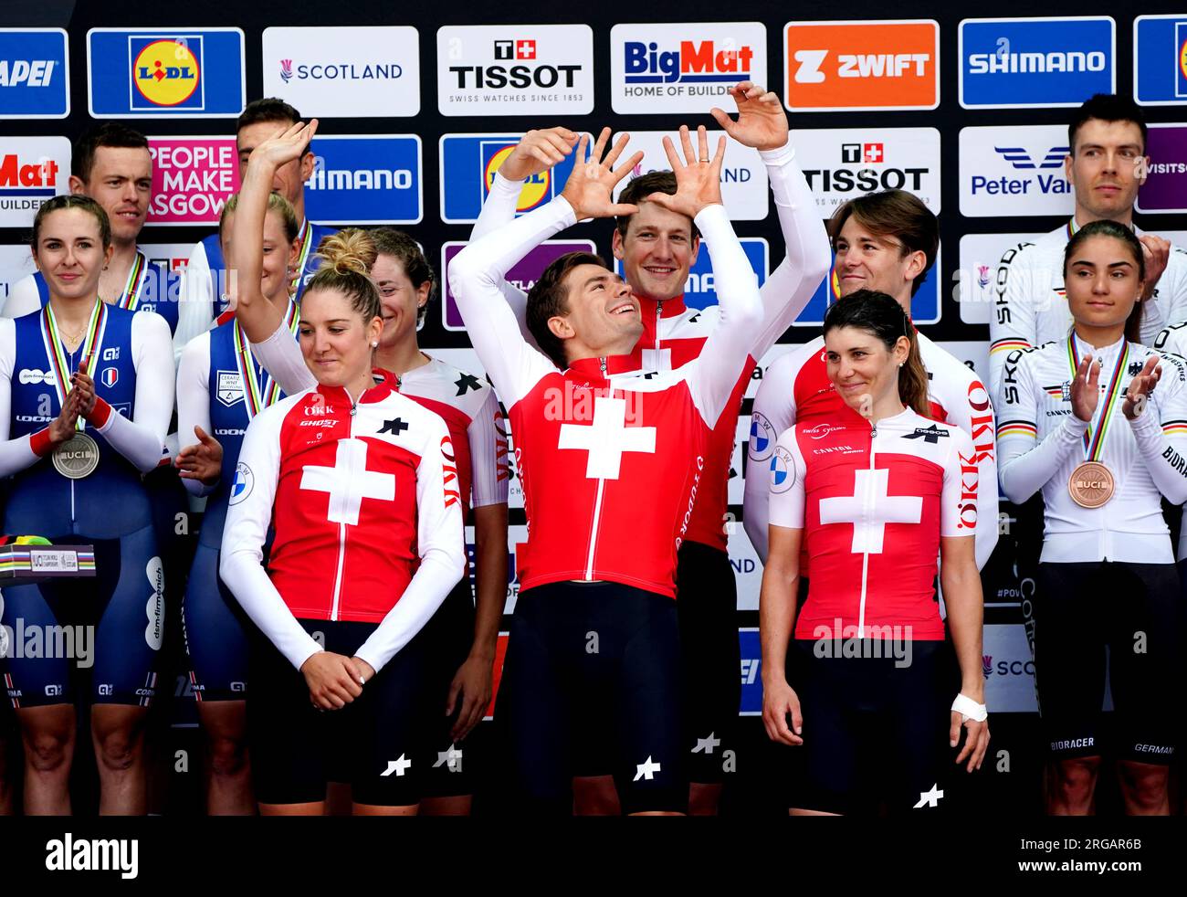 Switzerland's Stefan Bissegger, Stefan Kung, Mauro Schmid, Elise ...
