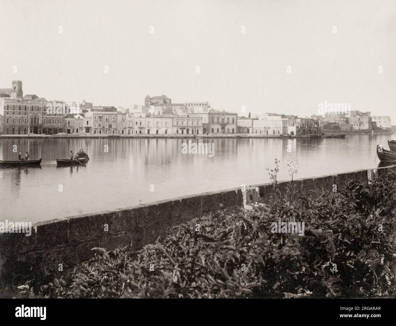 Vintage 19th century photograph: view of the waterfront, harbour at the ...