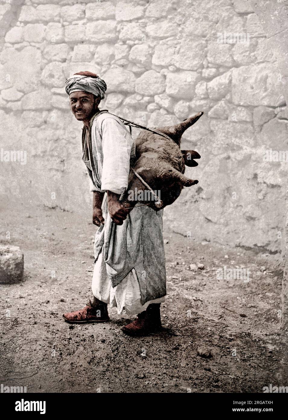 c.1890's Photochrome Egypt - water carrier Stock Photo - Alamy