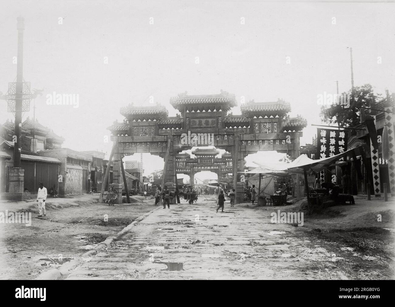 Early 20th century photograph: Gate and street, likely Peking, Beijing ...