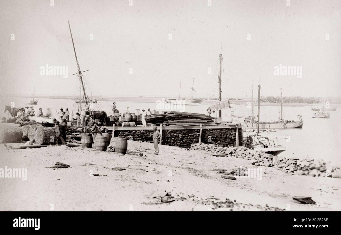 Vintage 19th century photograph: pier and ship being unloaded, Cossack ...