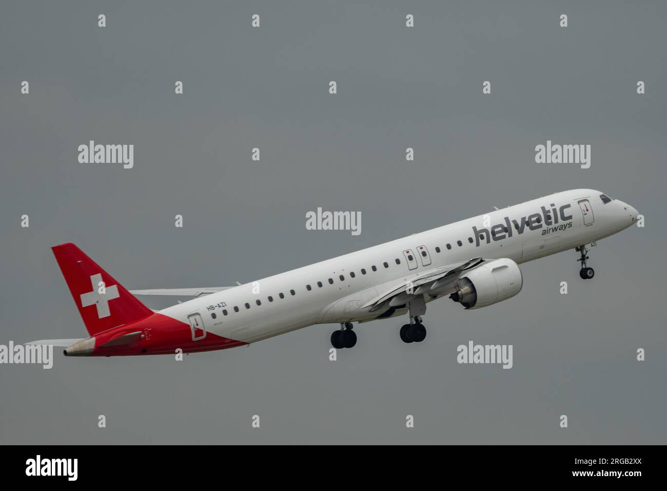 Zurich, Switzerland, May 19, 2023 HB-AZI Helvetic Airways Embraer E195 ...