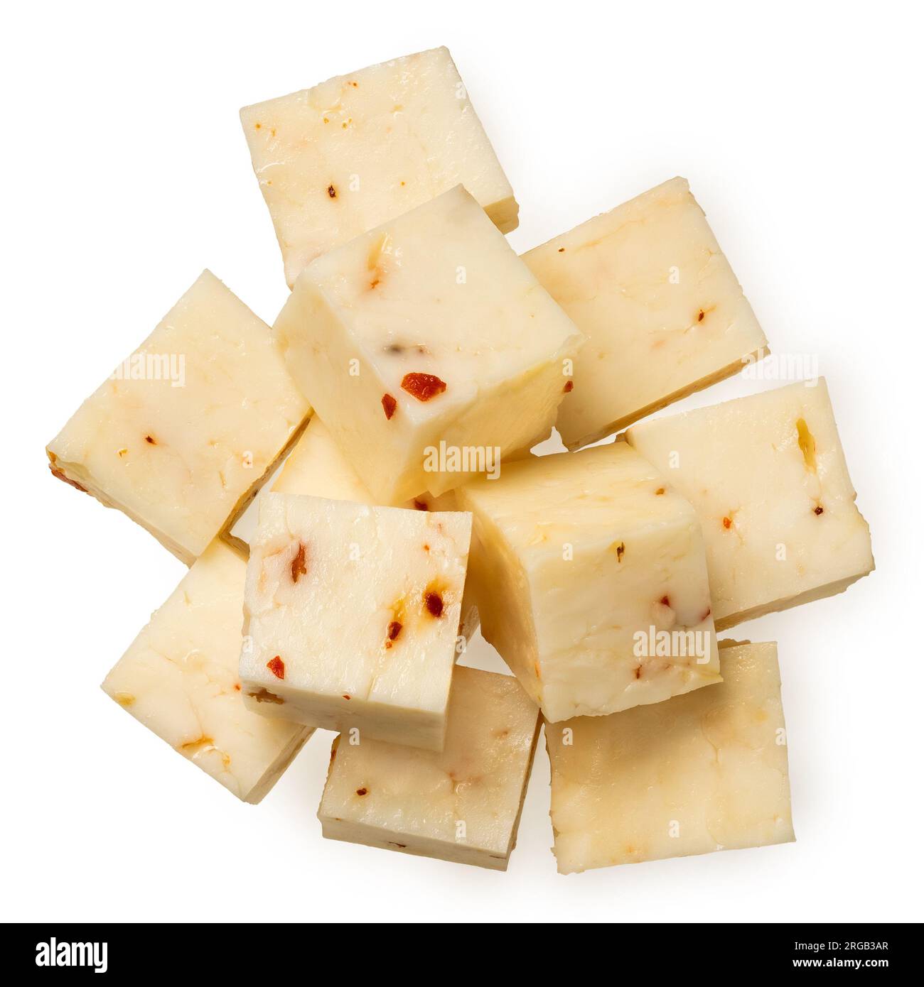 Cubes of halloumi cheese with red chilli isolated on white. Top view ...