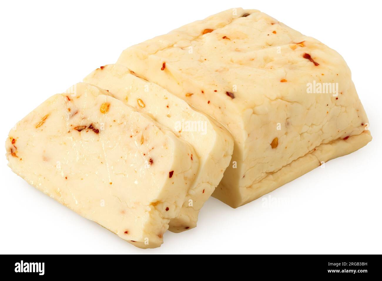 Sliced block of halloumi cheese with red chilli isolated on white Stock ...