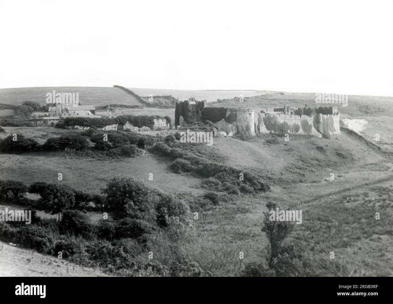 View of landscape with Manorbier Castle (Castell Maenorbyr) - a Norman ...