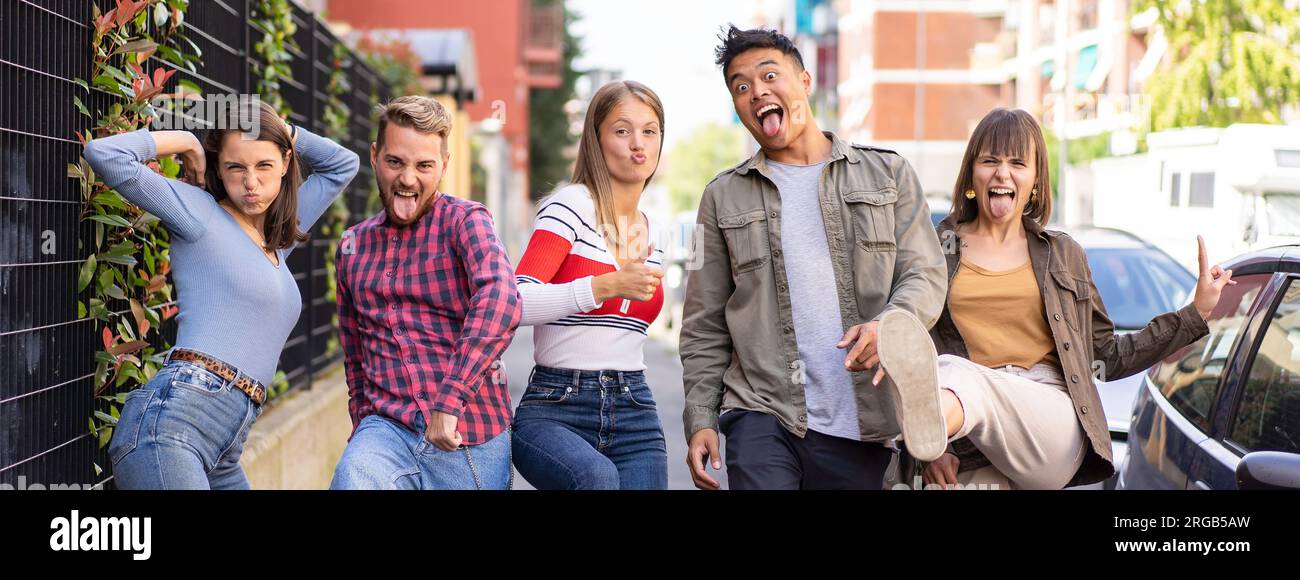 Horizontal banner with multiethnic friends walking at sidewalk acting ...