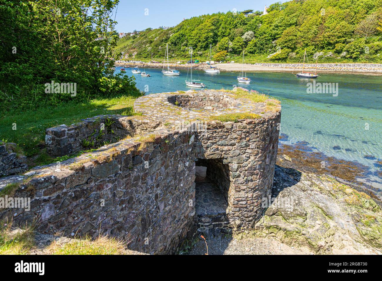 An old lime kiln at Solva Harbour in the estuary of the River Solva at ...