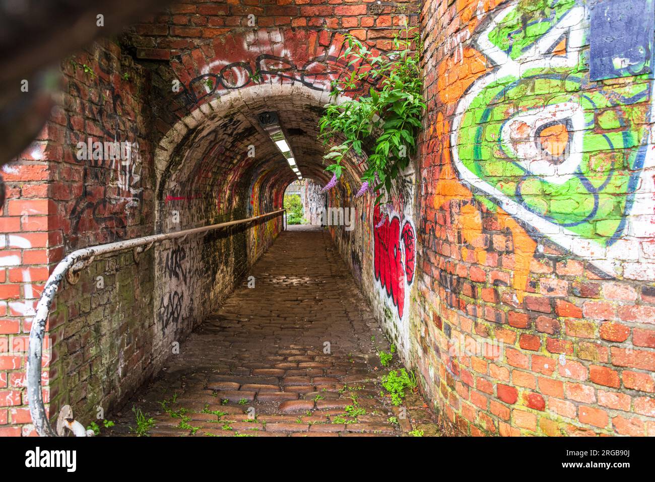 The old towpath under the Road bridge over the Rochdale Canal in ...
