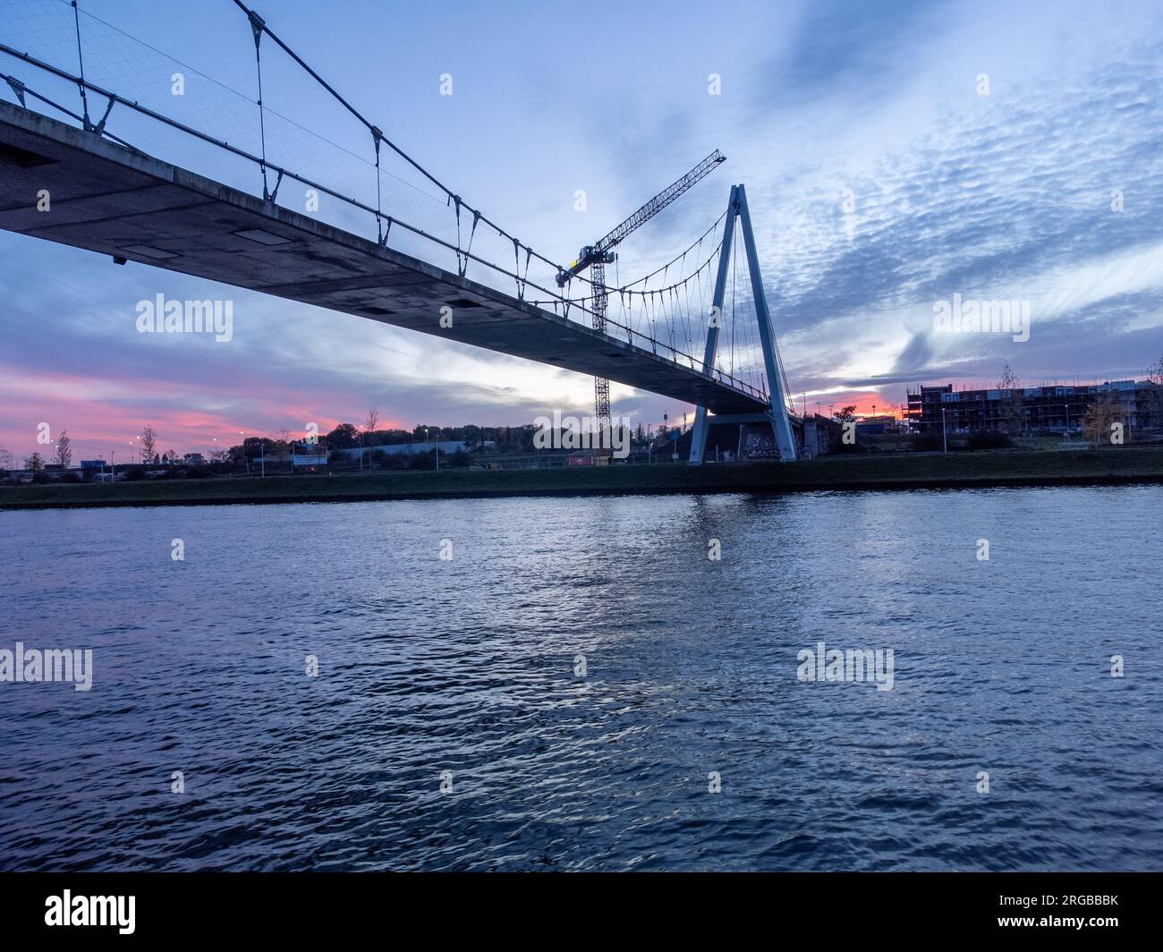 A bridge with a purple colouring sky Stock Photo - Alamy