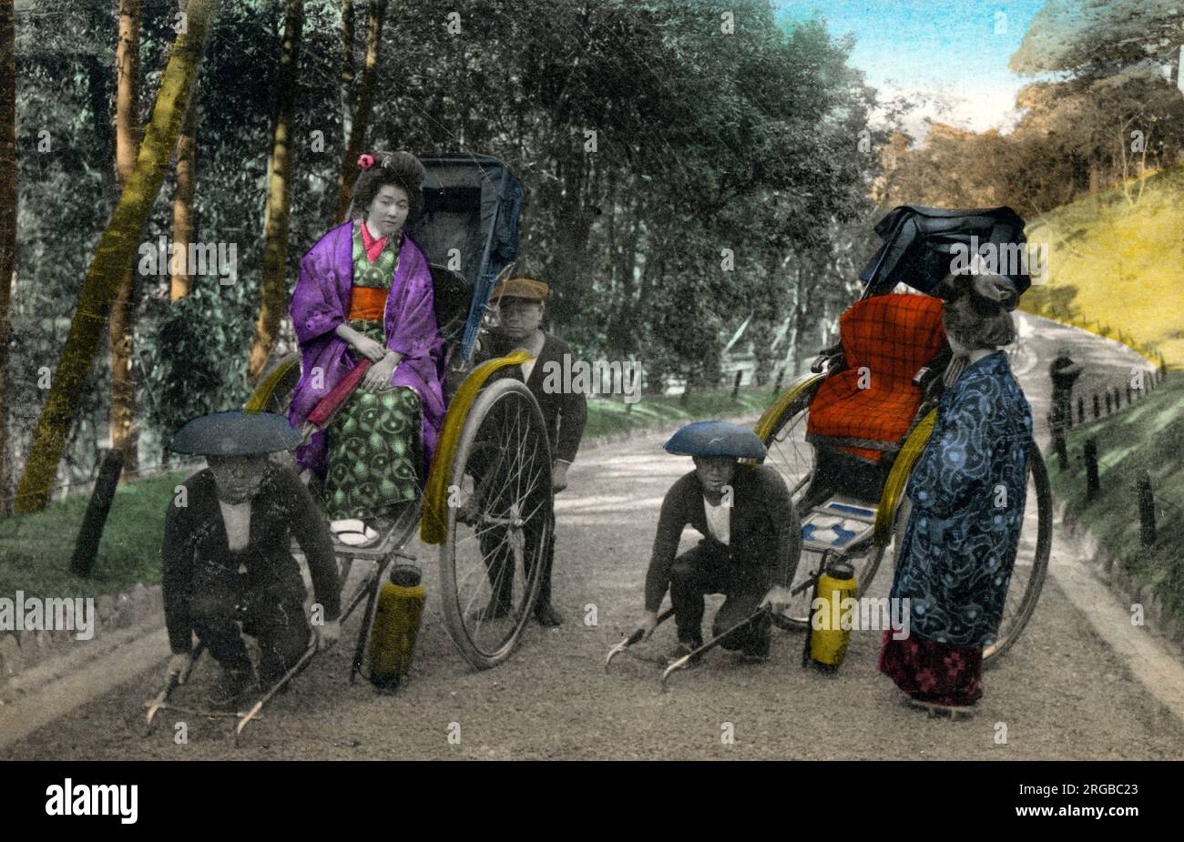 Two Japanese women get into their rickshaws (2/3 Stock Photo - Alamy