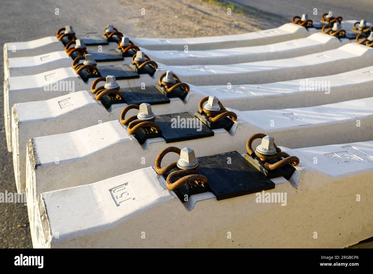 Before trackwork stacked new modern white reinforced concrete railroad ...