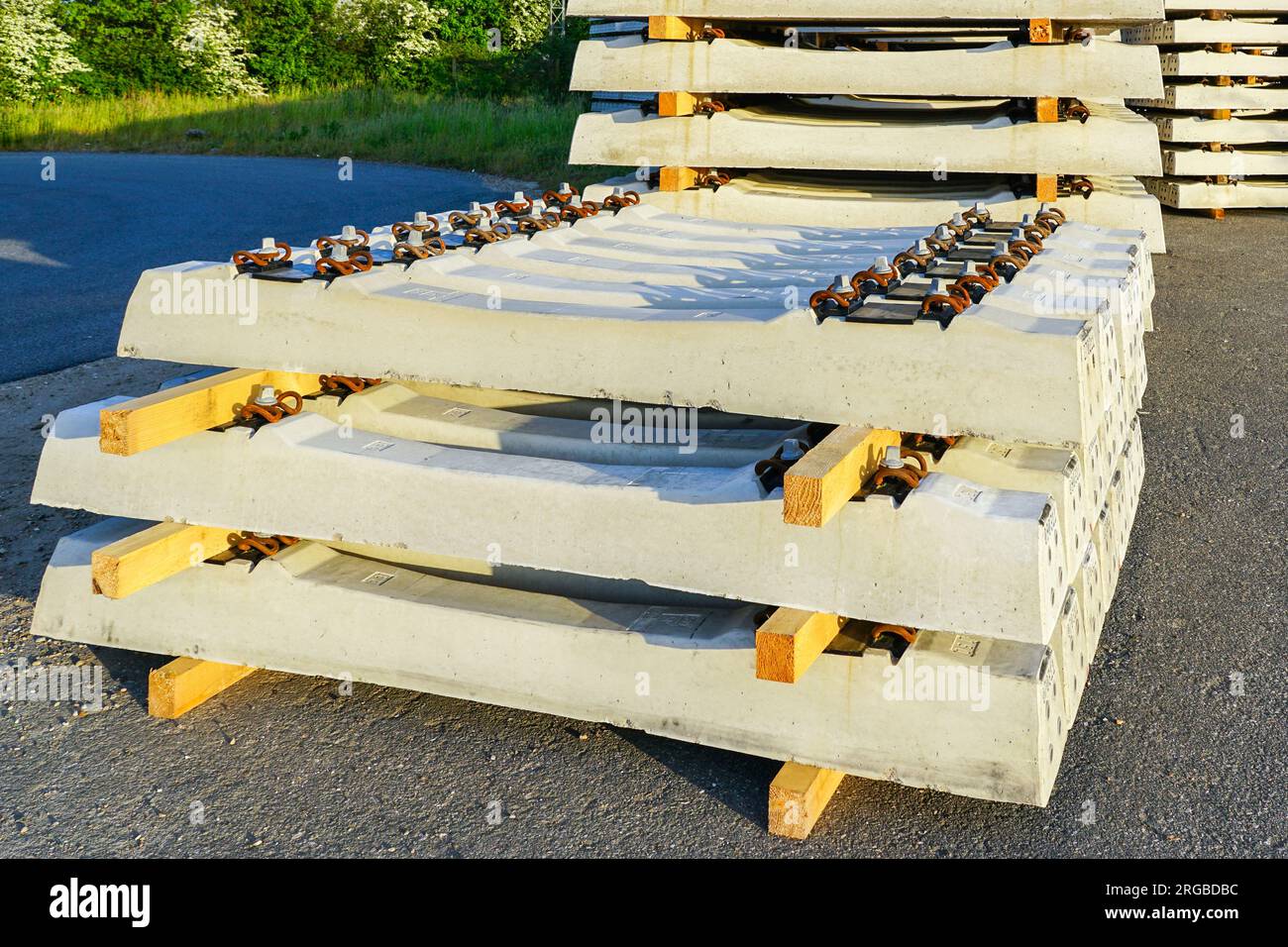 Before trackwork stacked new modern white reinforced concrete railroad ...