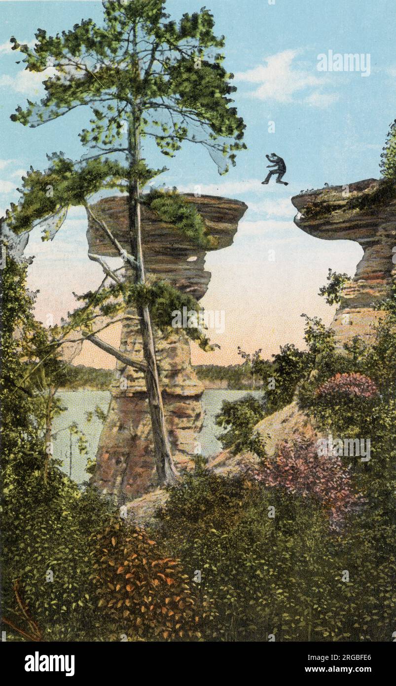 Stand Rock, Wisconsin River, Wisconsin, USA (a small jumping figure ...