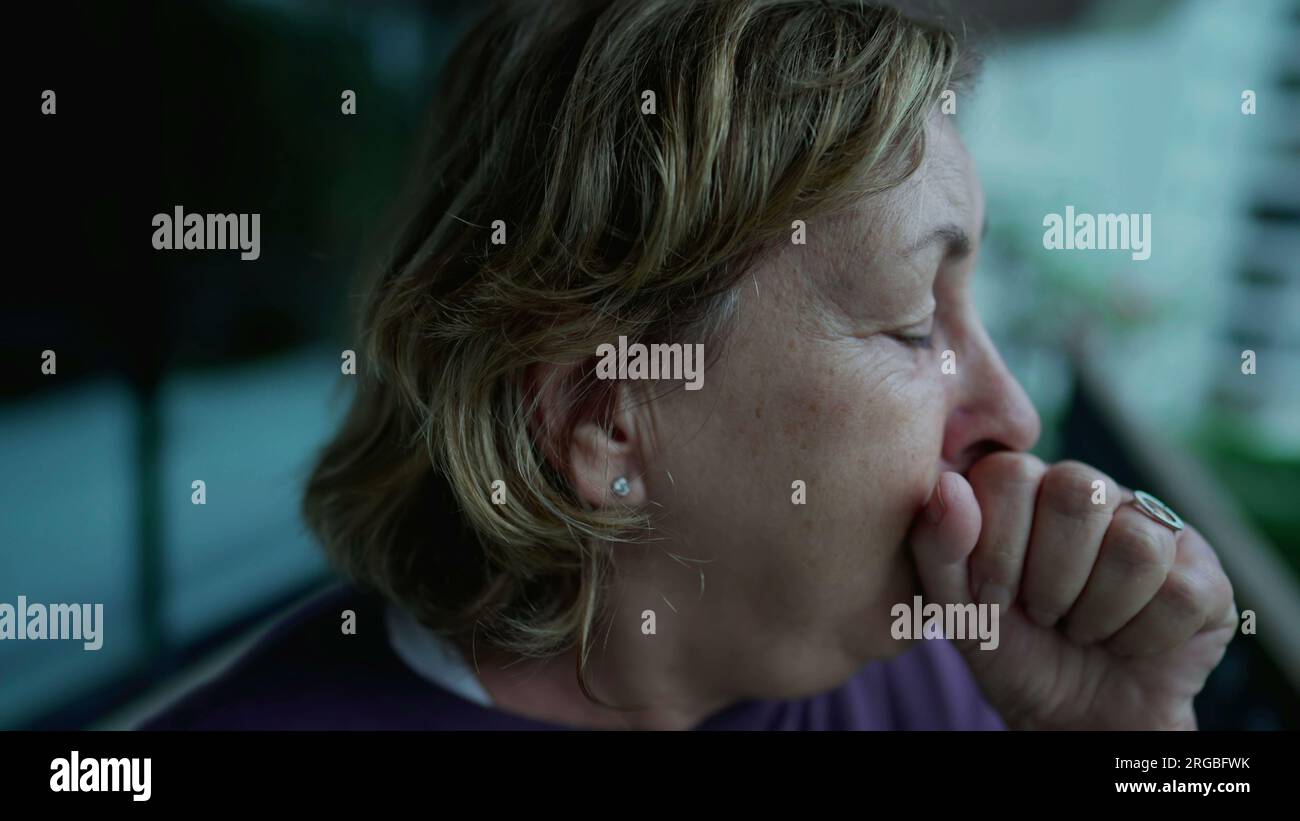 Senior woman coughing. Real life authentic older lady coughs covering ...