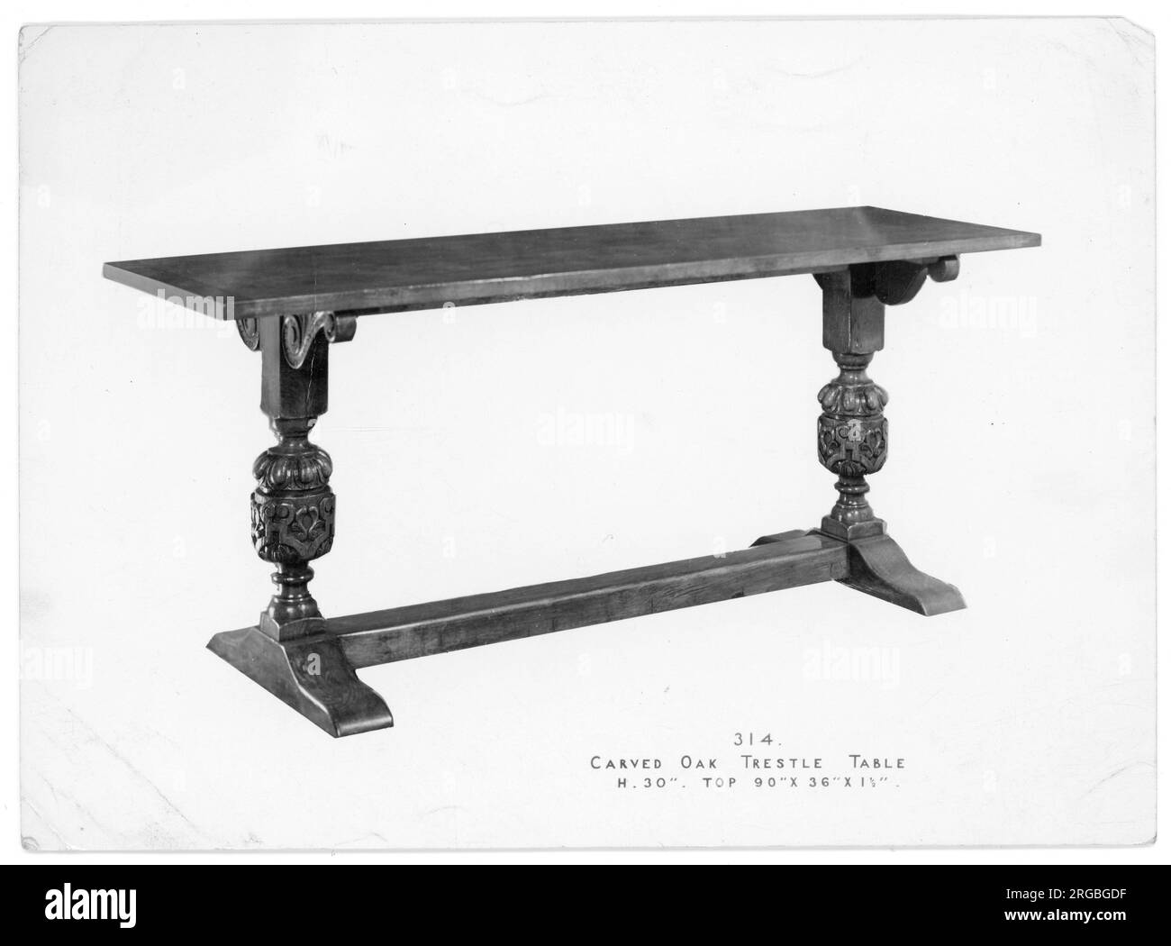 Carved Oak trestle table from a furniture showroom catalogue, numbered ...