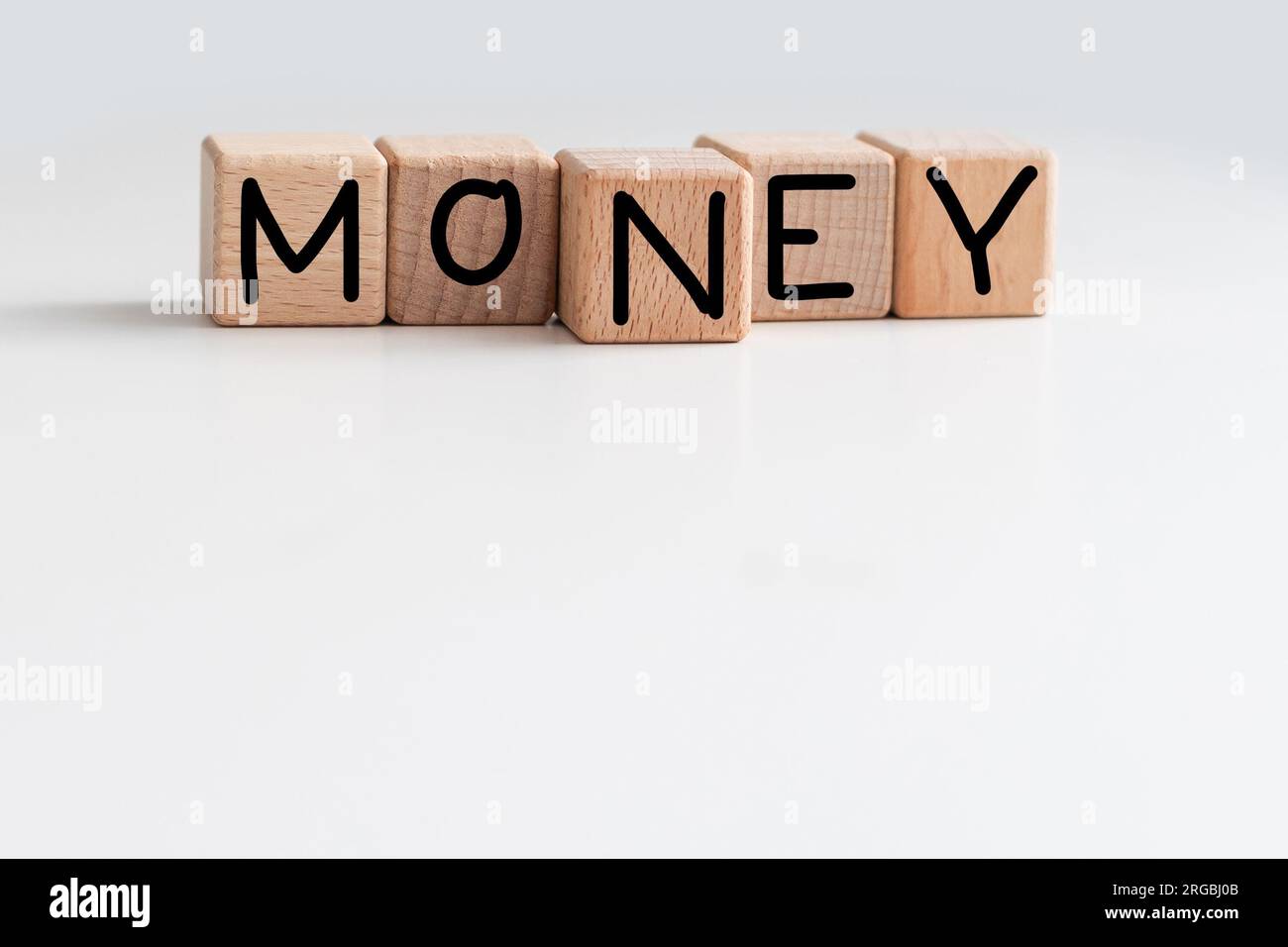 Wooden blocks spell economy word hi-res stock photography and images ...