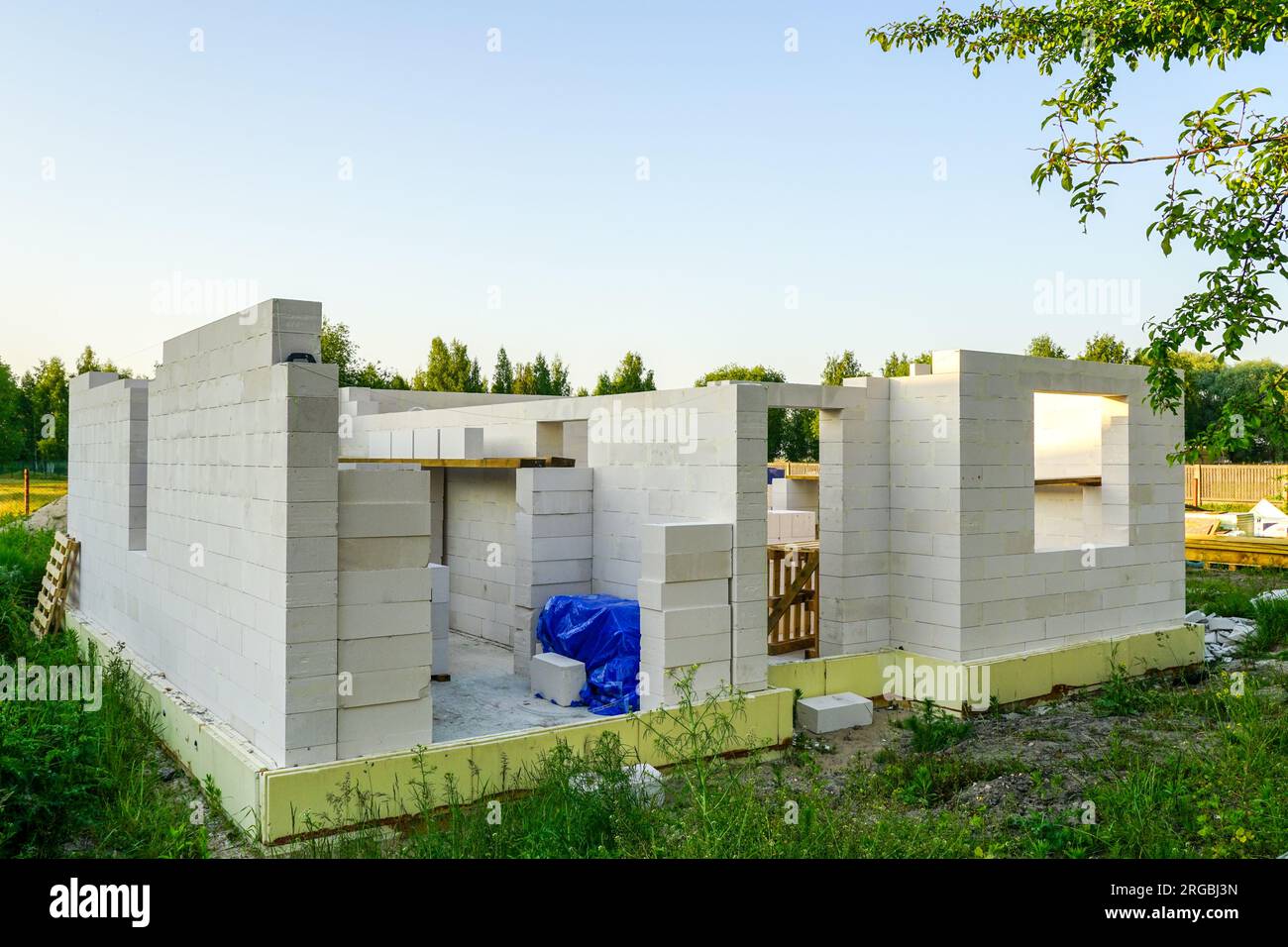 Single family house construction site, wall construction from concrete ...