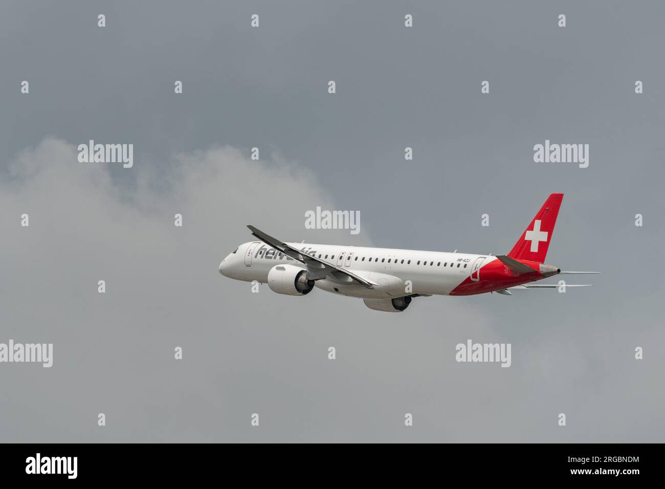 Zurich, Switzerland, July 13, 2023 HB-AZJ Helvetic Airways Embraer E195 ...